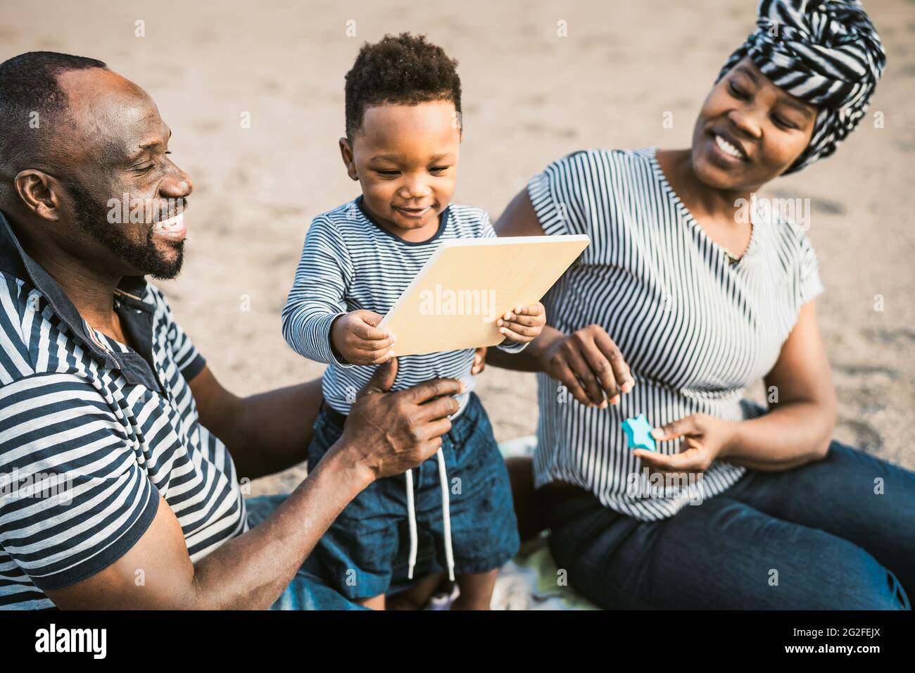 Family joy beach happy hi-res stock photography and images - Alamy