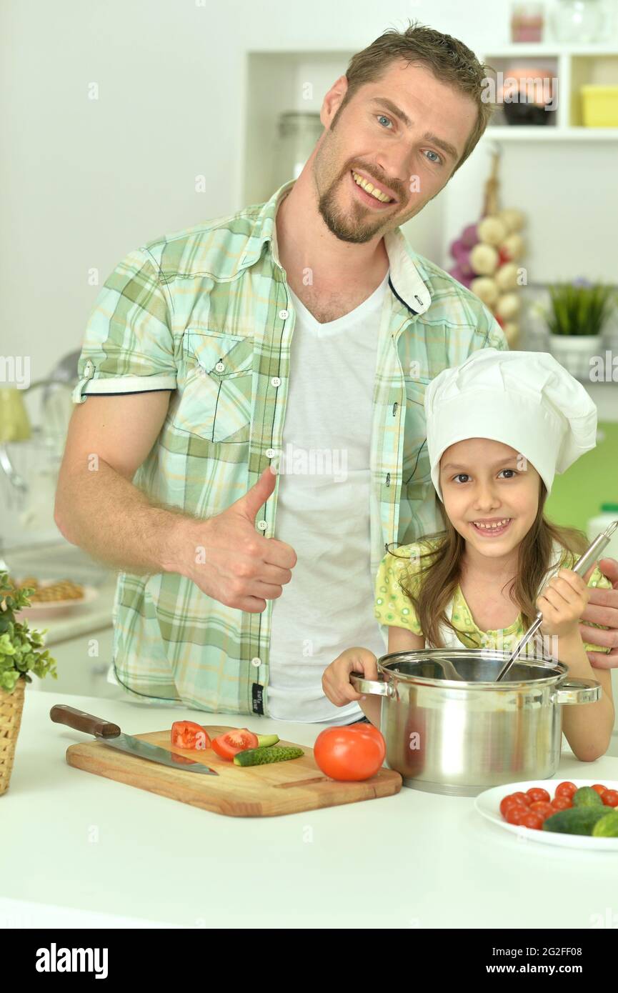 Father daughter in kitchen apron hi-res stock photography and images ...