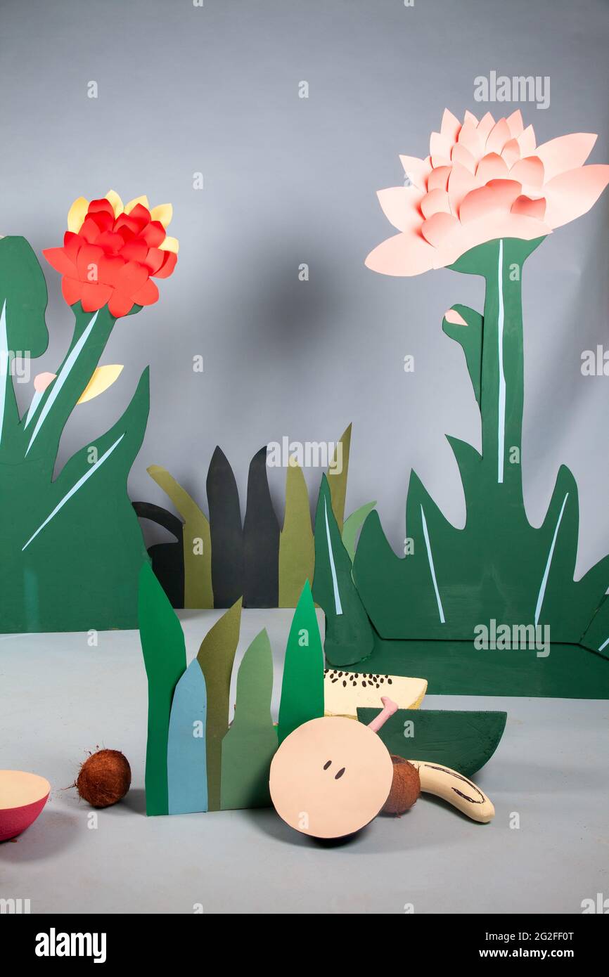 Floral paper craft backdrop set design jungle theme Stock Photo - Alamy