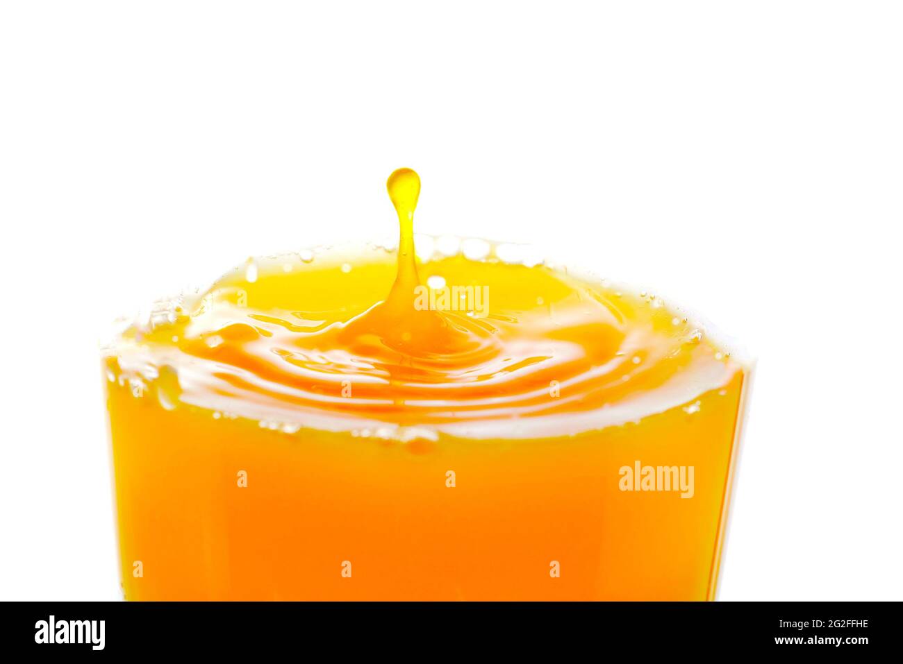 macro of orange juice drop splash isolated on white background Stock ...