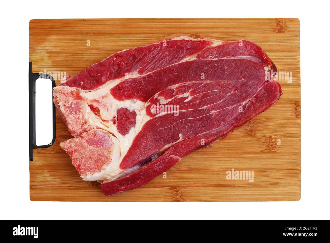 top view of raw beef meat on a cutting board isolated on white ...