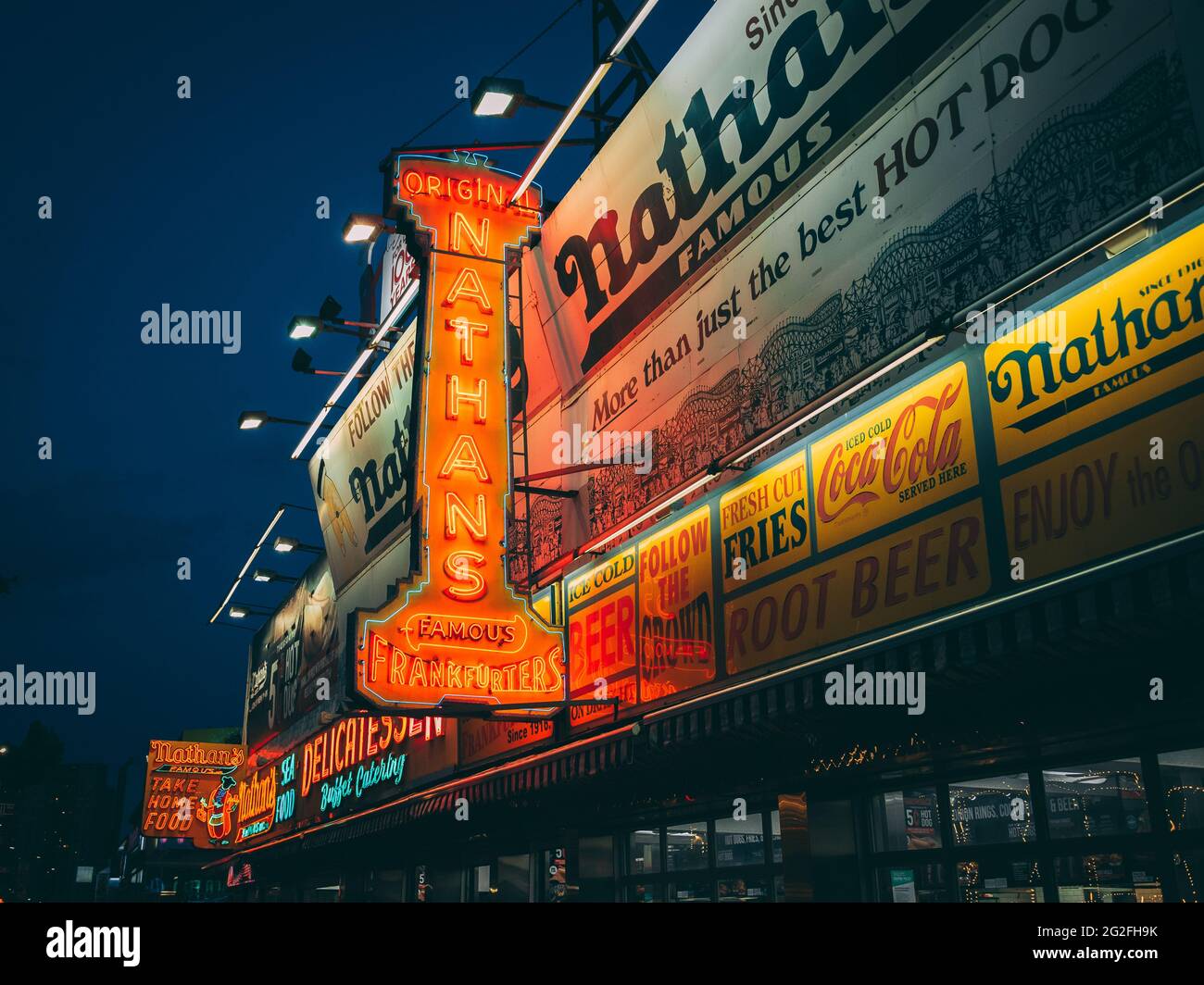 Nathans neon signs at night, in Coney Island, Brooklyn, New York City ...