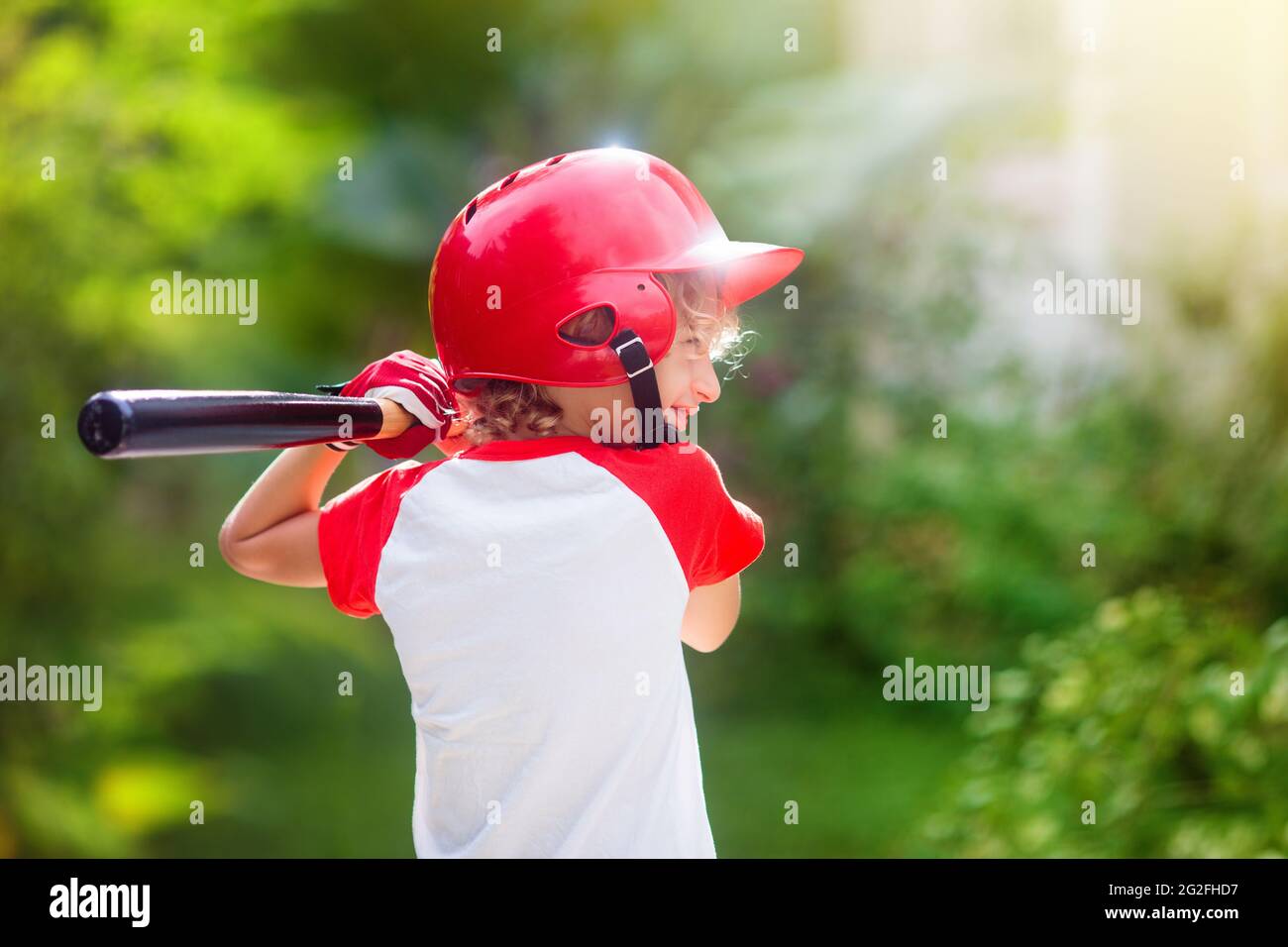 Kids play baseball. Child with bat and ball. Outdoor activity for ...