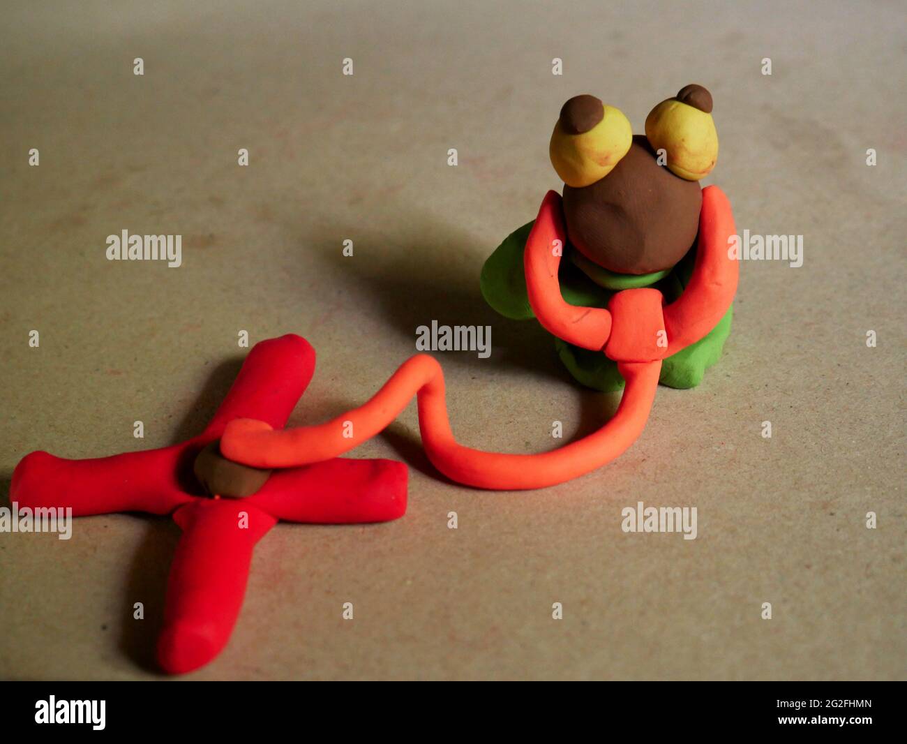 Doctor frog clay with red color plus sign and stethoscope Stock Photo ...