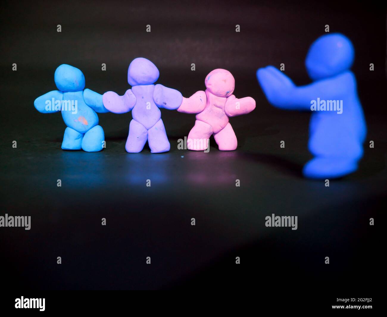 Unity is the power presenting buy three clay man cartoon on dark ...