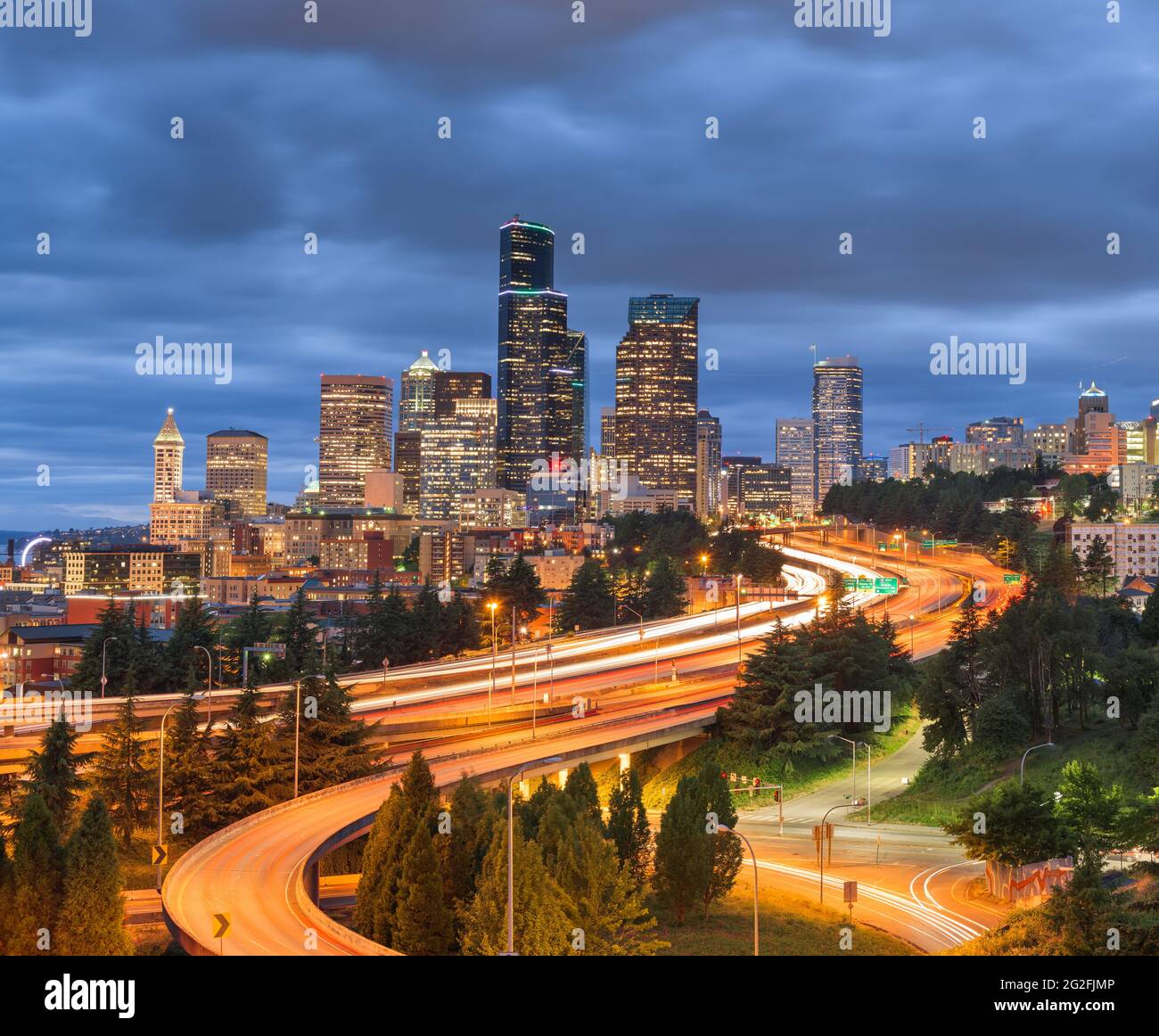 Seattle, Washington, USA downtown city skyline over highways at dusk ...