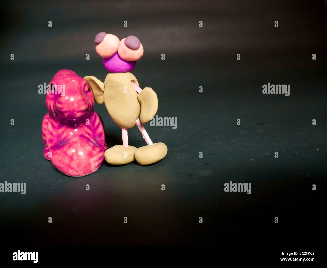 Clay frog with rabbit standing together friendly concept Stock Photo ...