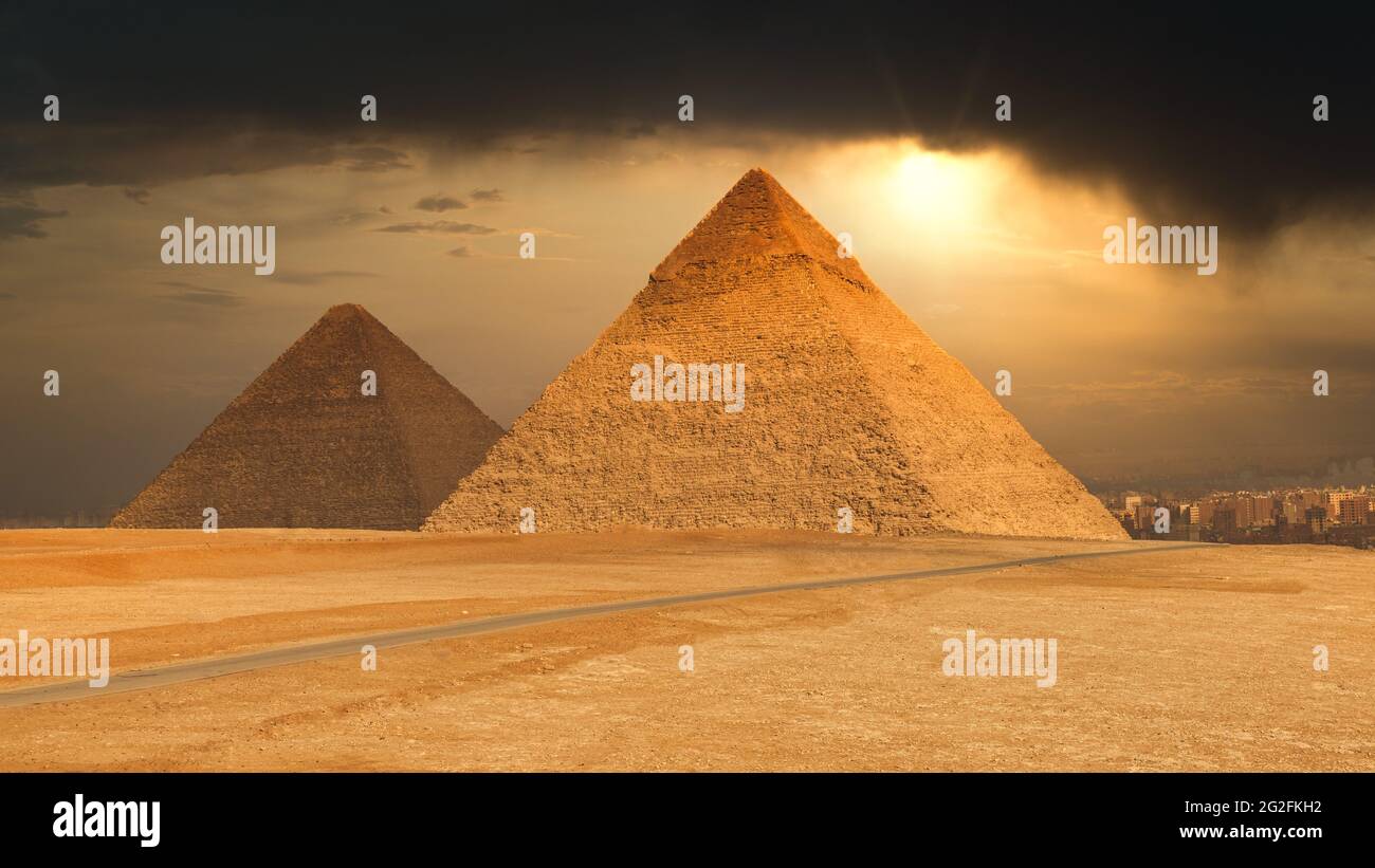 The Famous Pyramids At Giza In Egypt With A Dramatic Sky Stock Photo ...