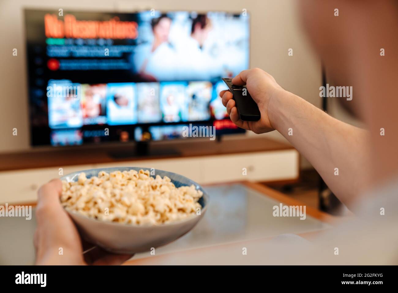 Tv remote control popcorn hi-res stock photography and images - Alamy