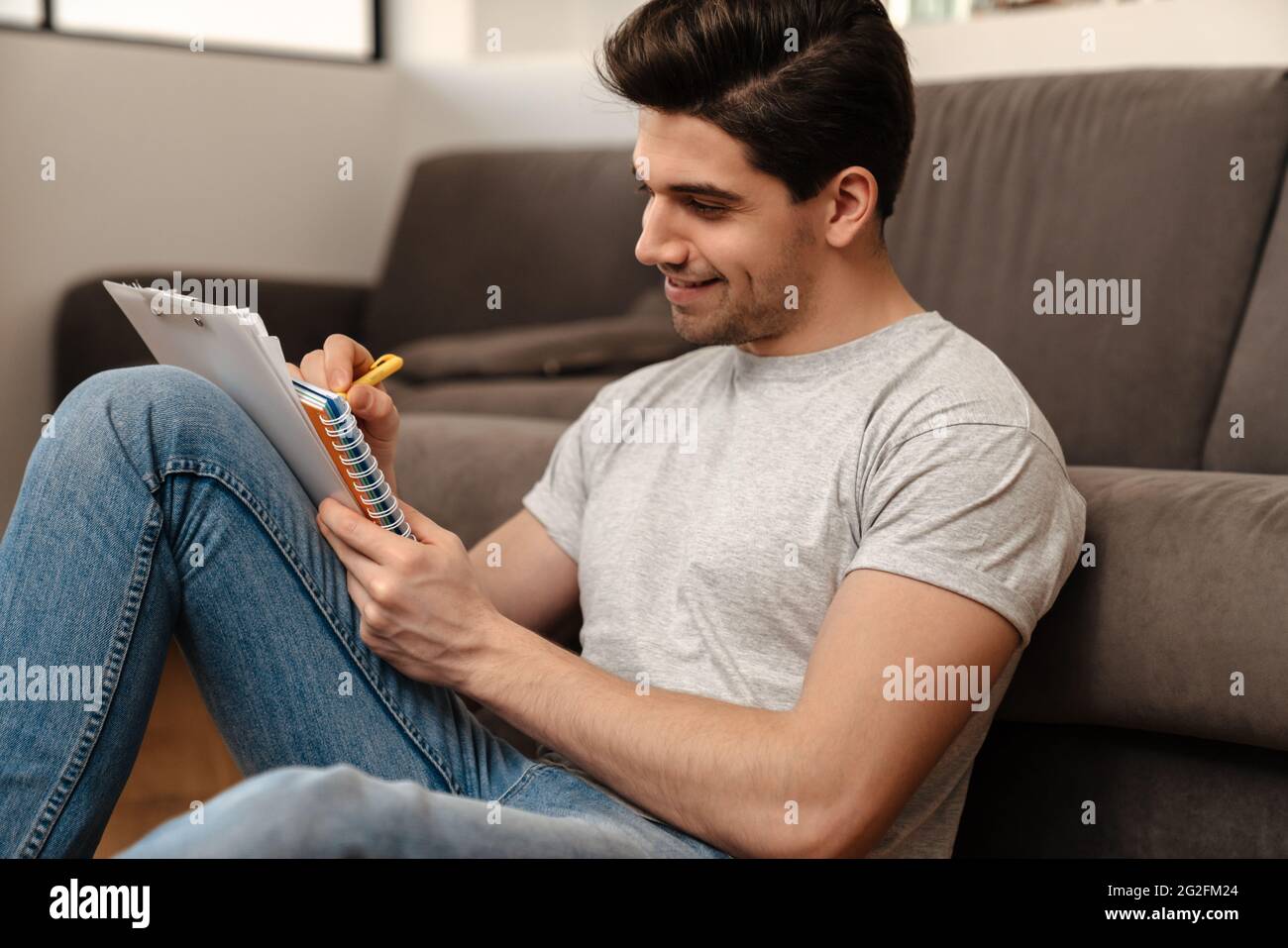 Guy writing hi-res stock photography and images - Alamy
