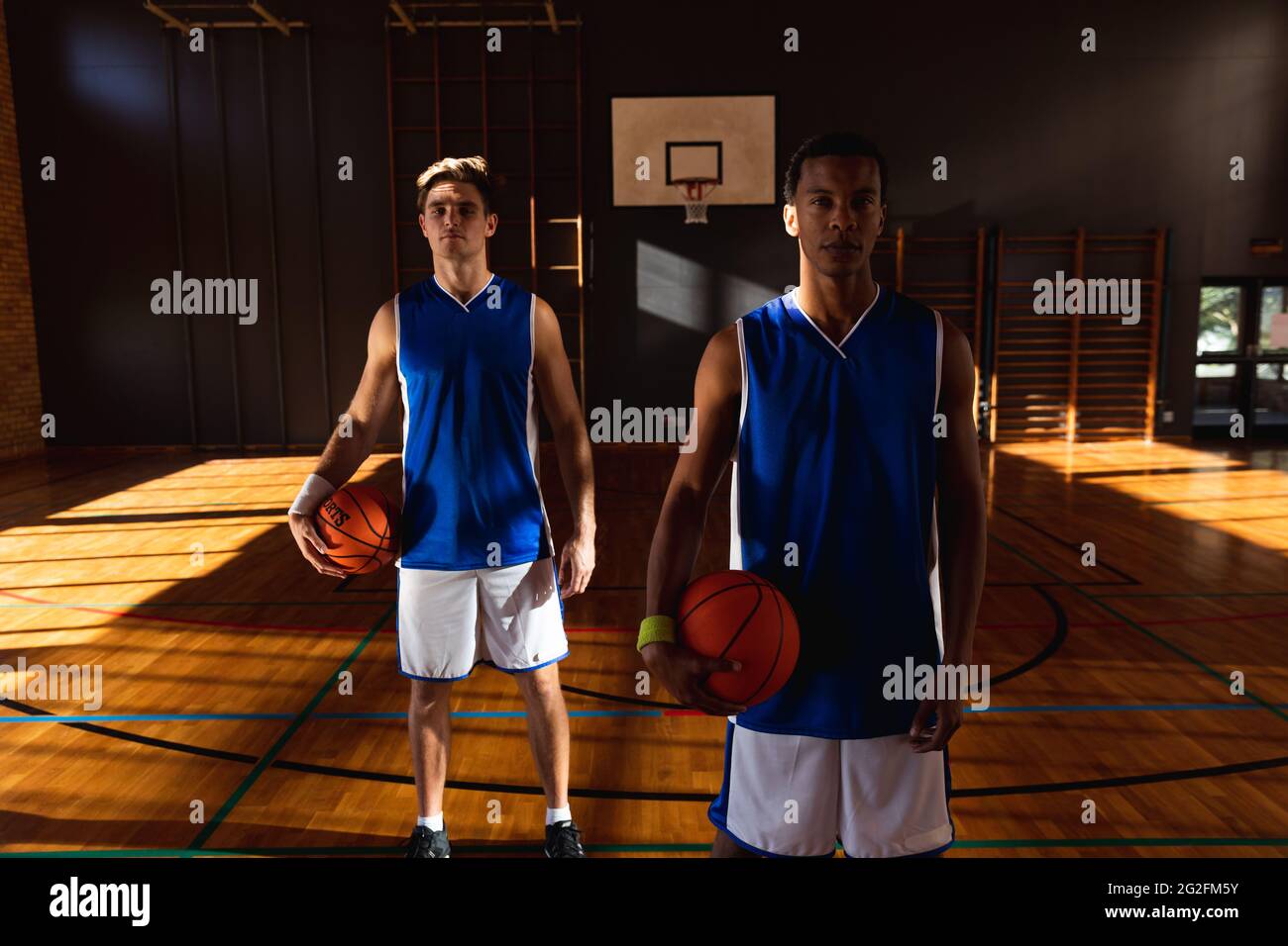 Happy diverse male basketball players hi-res stock photography and ...
