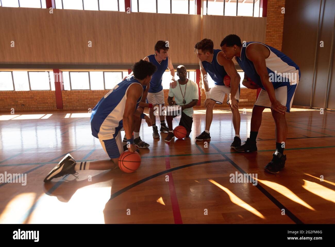 Male football huddle hi-res stock photography and images - Alamy