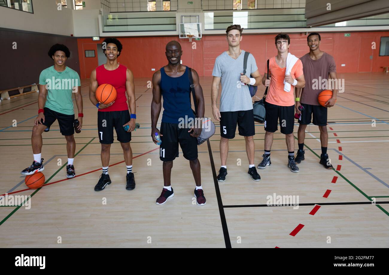 Smiling young male team hi-res stock photography and images - Alamy