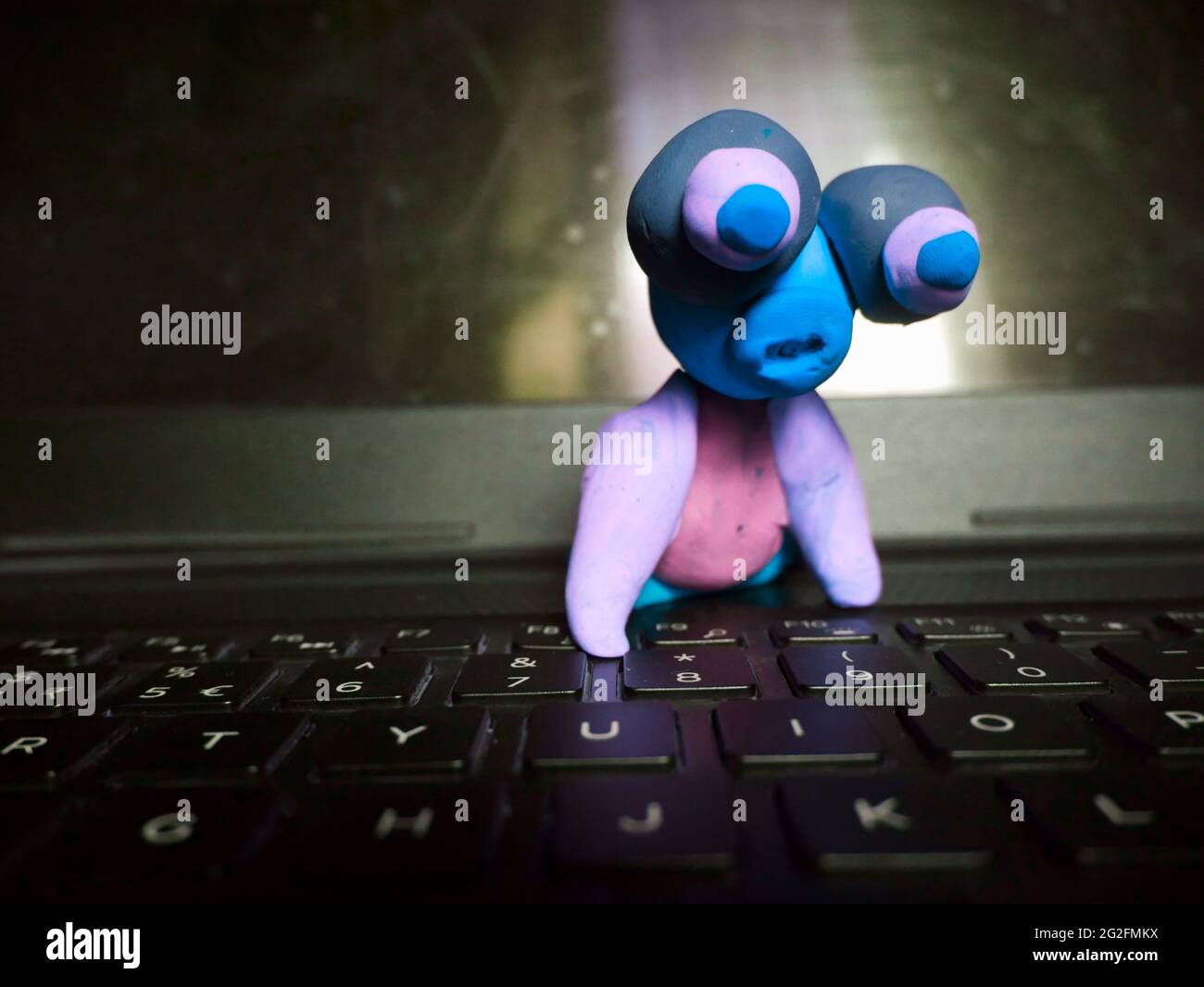 Clay soft toy pressing laptop key board technology education concept ...