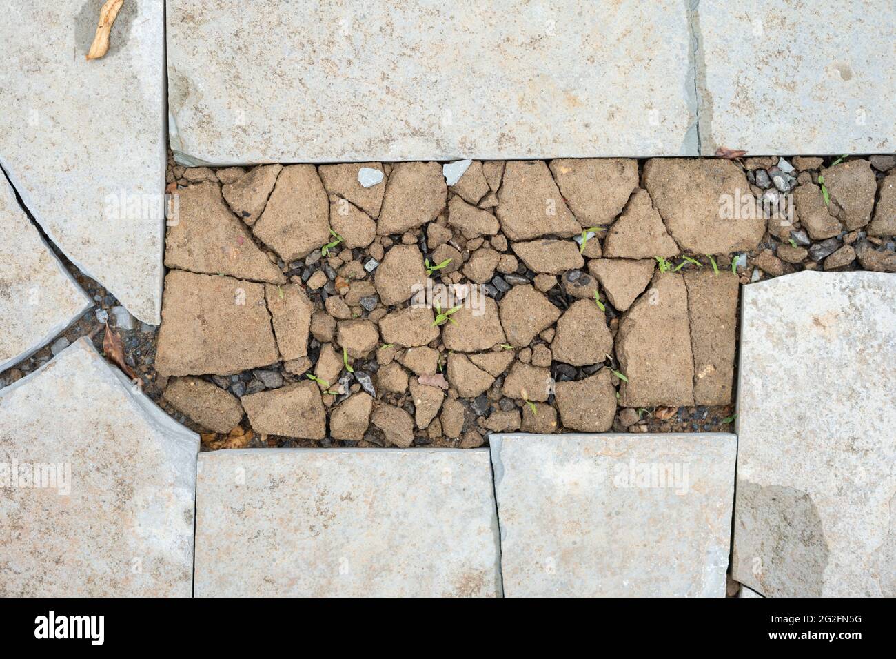 Closeup shot of a broken tile surface Stock Photo - Alamy