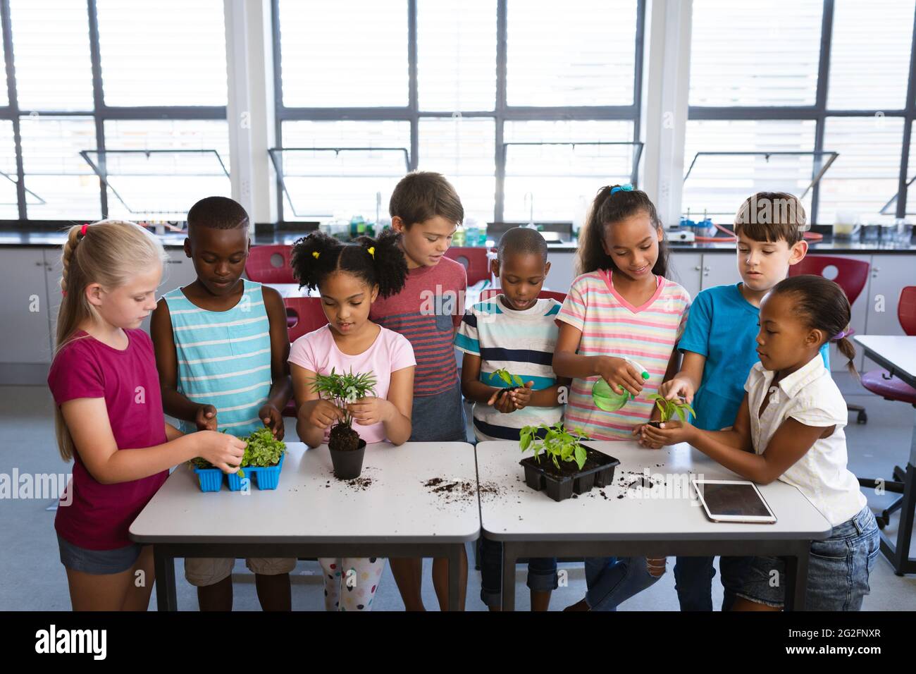 Students watering garden hi-res stock photography and images - Alamy