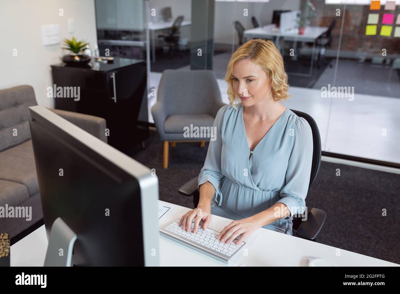 Person using computer and smiling hi-res stock photography and images ...