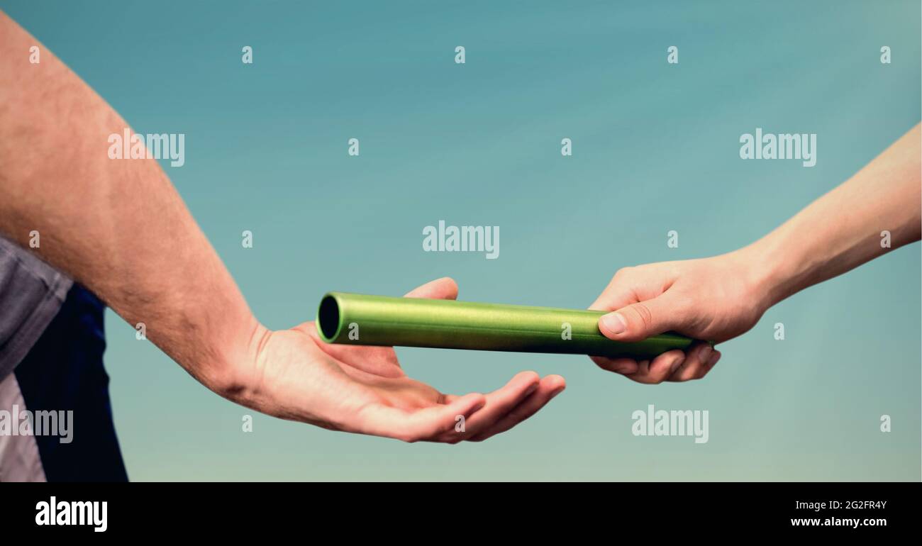 Composition of midsection of caucasian athletes passing green relay ...
