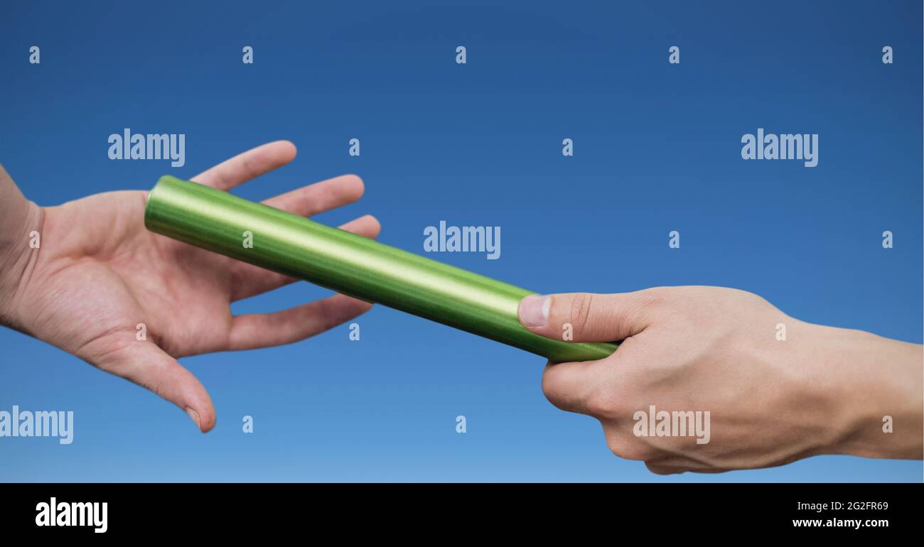Composition of midsection of caucasian athletes passing green relay ...