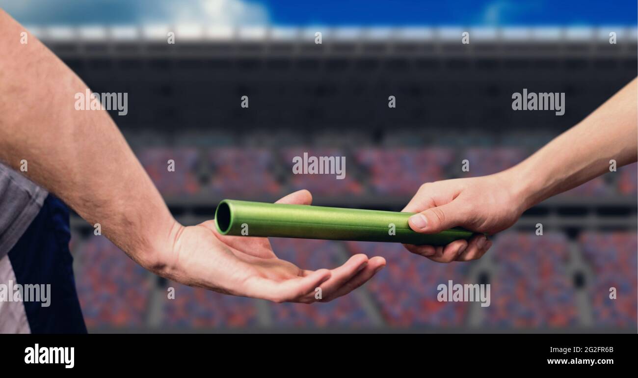Composition of caucasian athletes passing green relay baton over sports ...