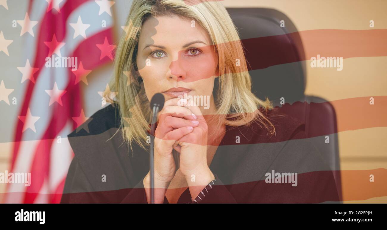 Waving american flag against portrait of caucasian female judge sitting ...