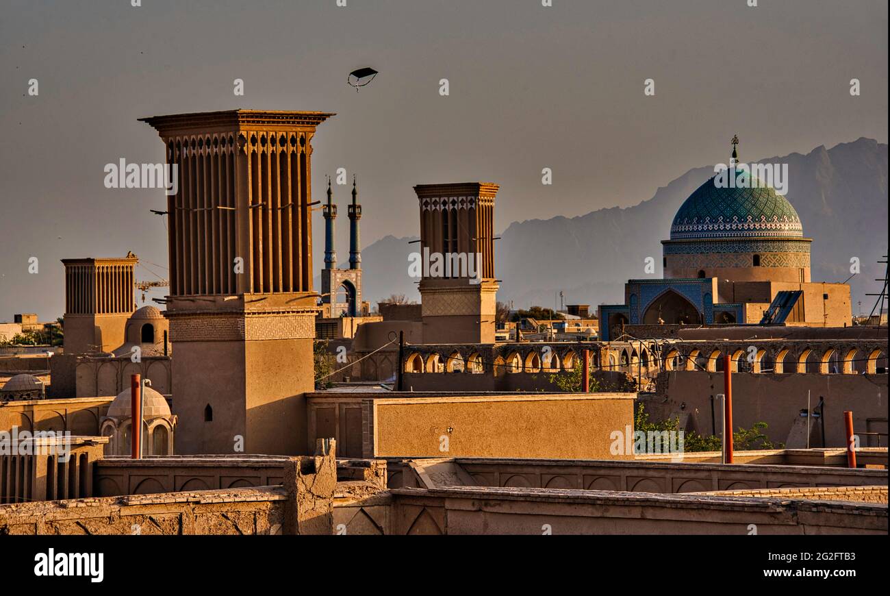 View of the roofs and skyline of Yazd with the badgirs, windcatchers ...