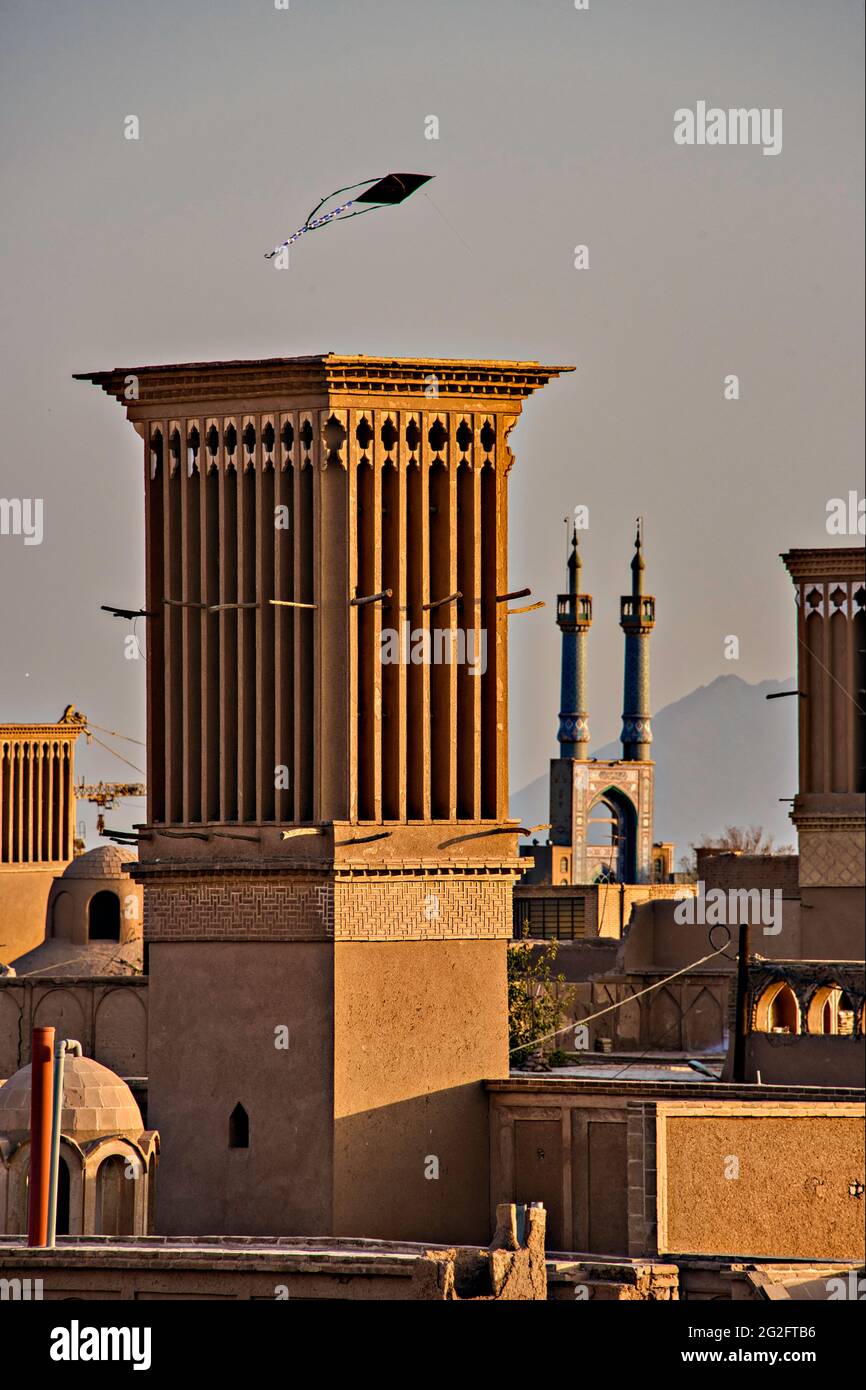 View of the roofs and skyline of Yazd with the badgirs, windcatchers ...