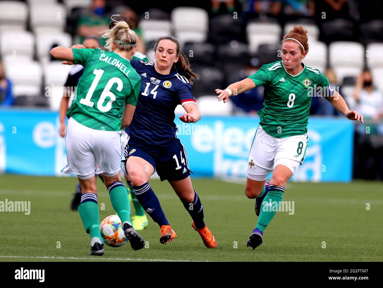 Scotland's Chloe Arthur (centre) battles for the ball with Northern ...