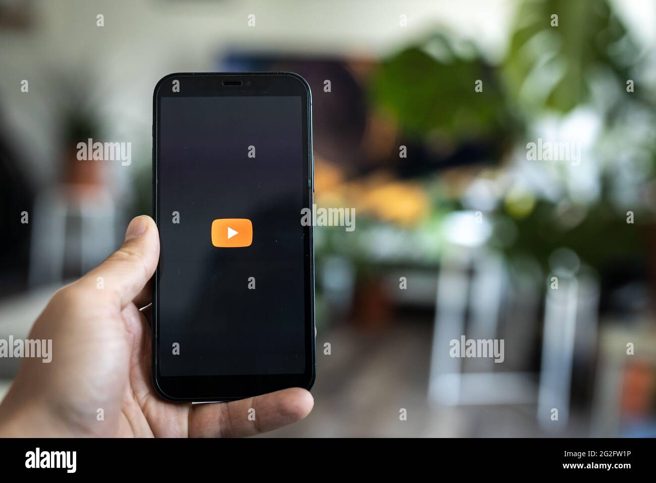 Youtube app opening on a phone screen Stock Photo - Alamy