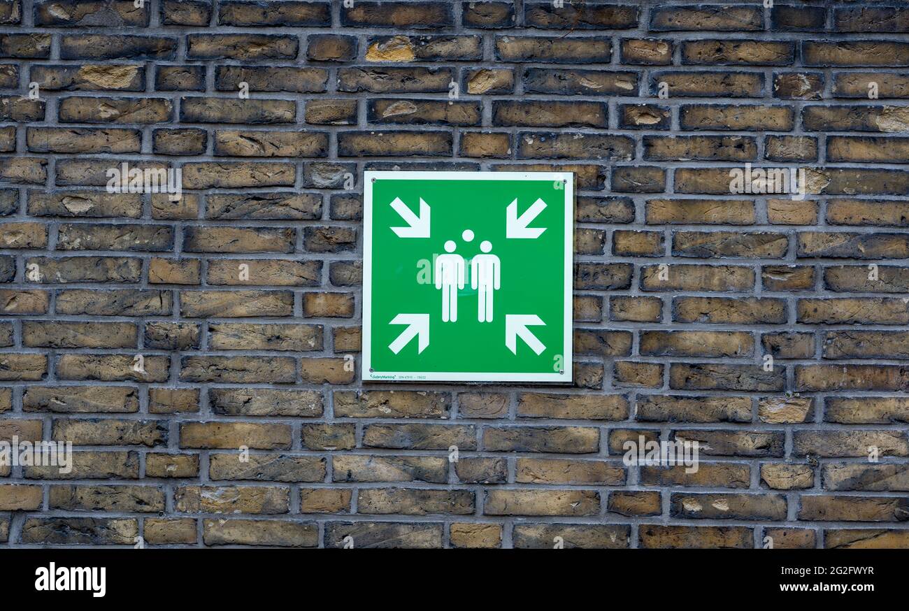 Safety assembly point sign hi-res stock photography and images - Alamy