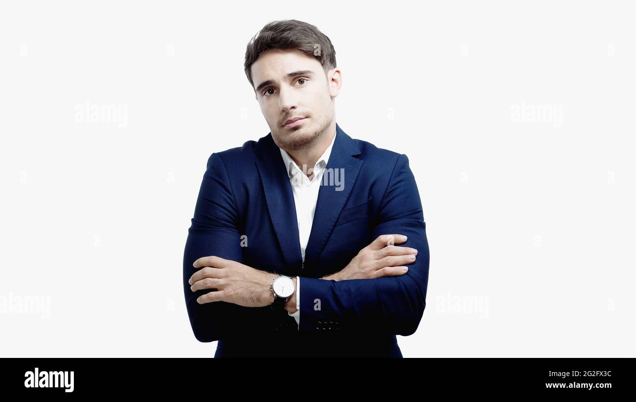 Confused manager in suit looking at camera isolated on white Stock ...