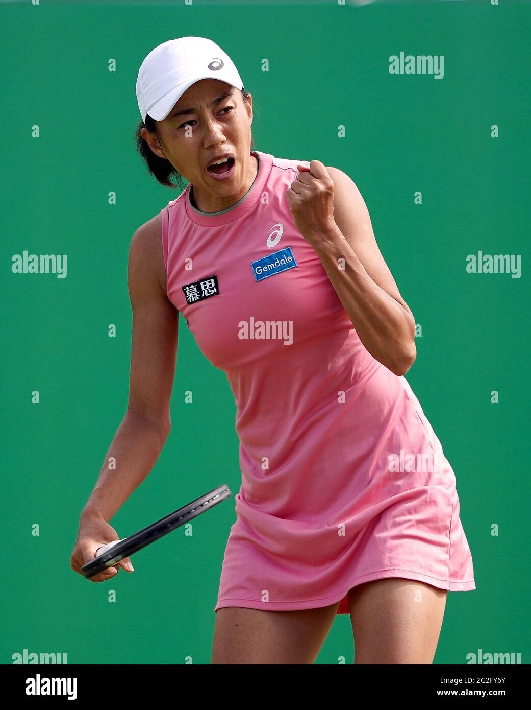 Shuai Zhang reacts during her WTA Quarter Final match against Kristina ...