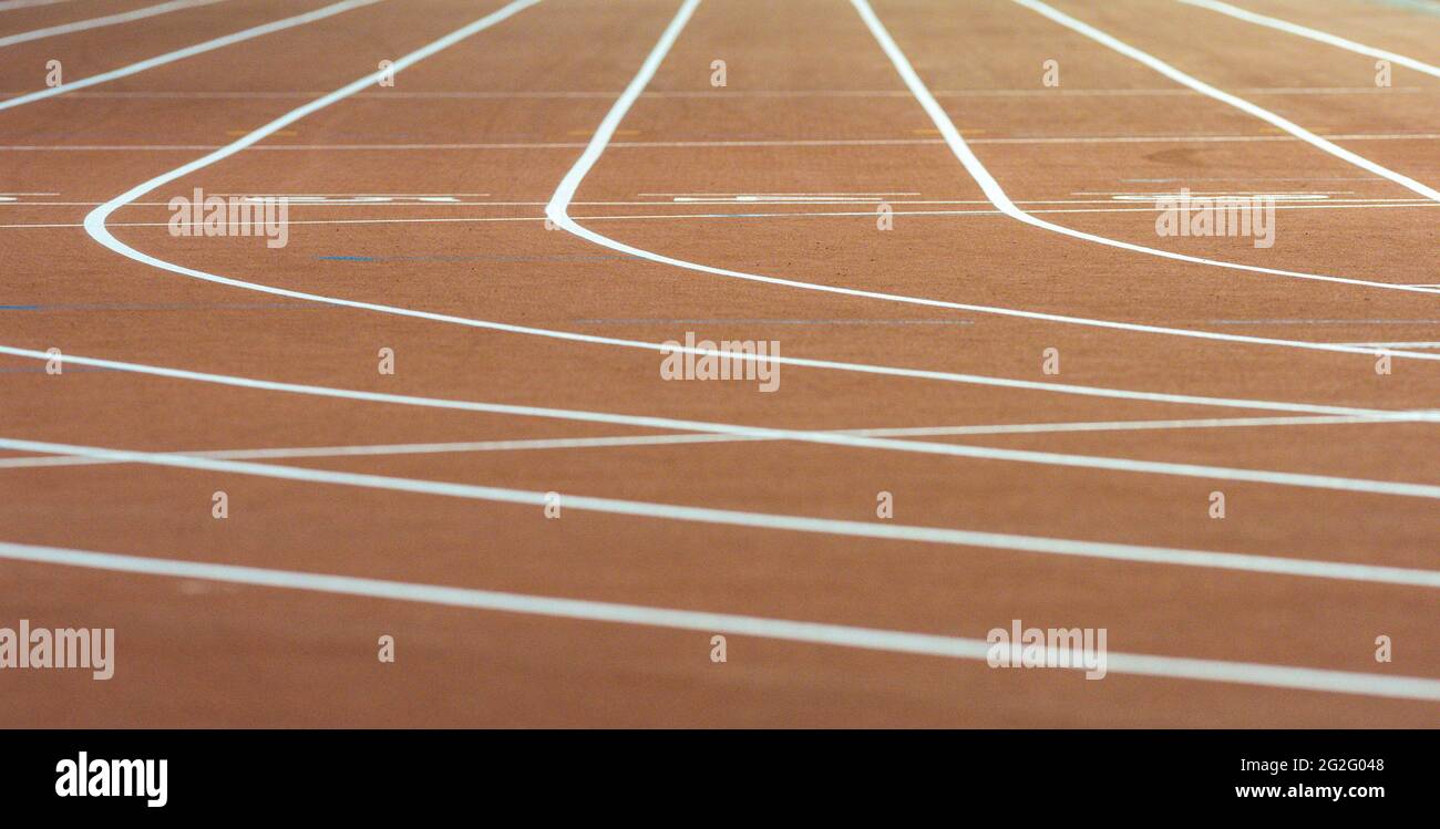 Empty lanes in a track and field stadium Stock Photo - Alamy
