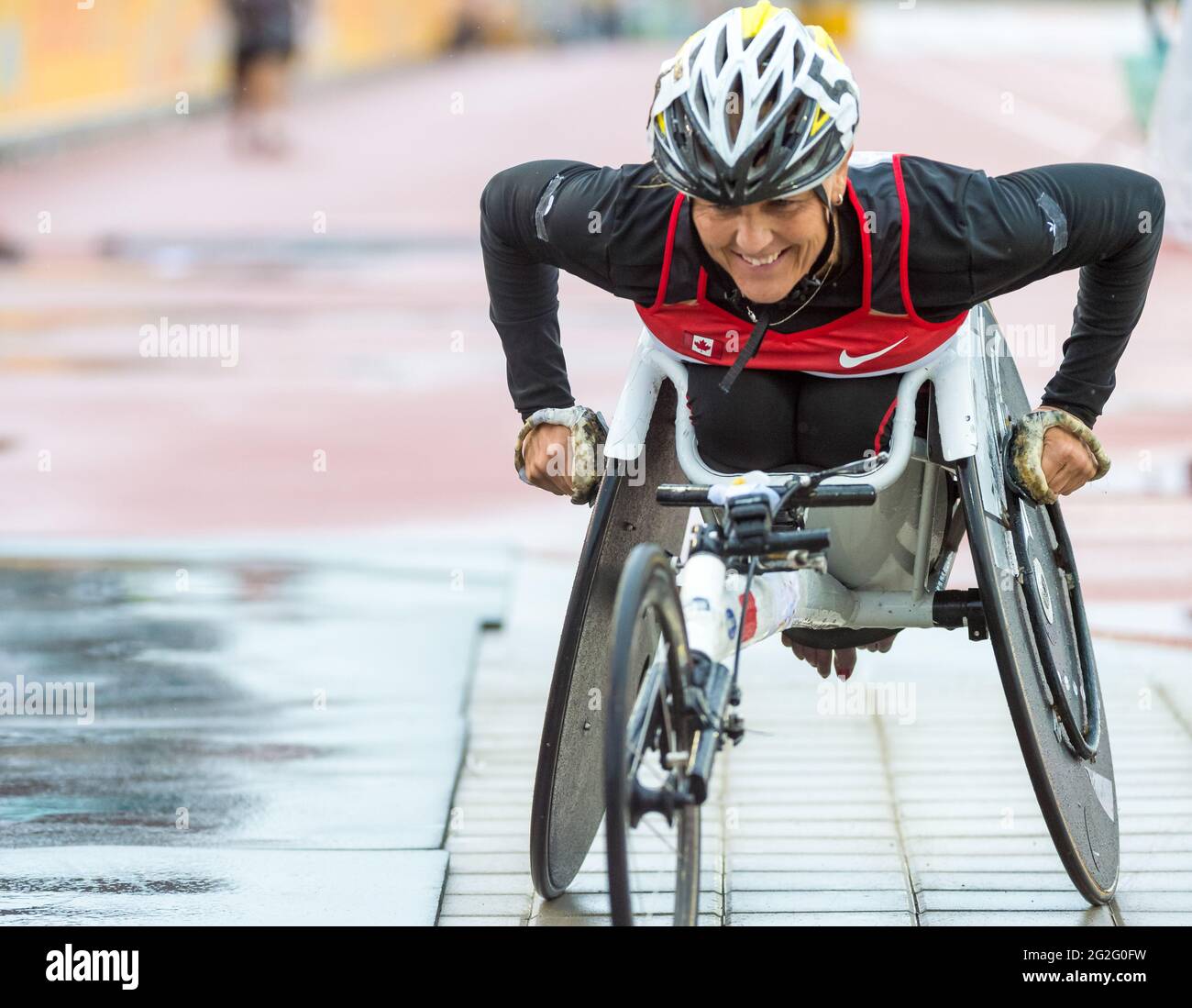 Canadian wheelchair racing athlete moving off the track in her ...
