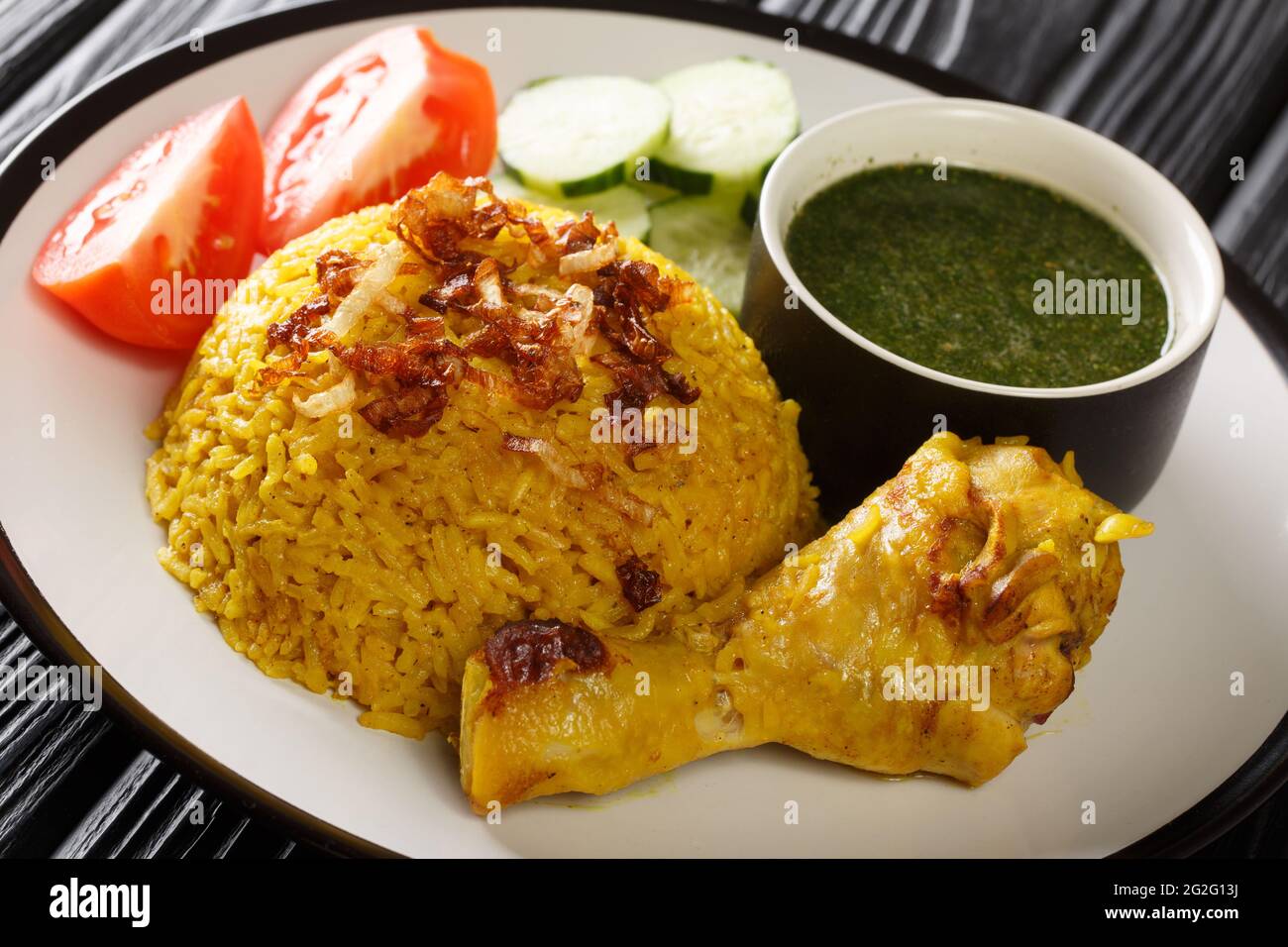 Thai Style Chicken Biryani Recipe Khao Mok Gai closeup in the plate on ...