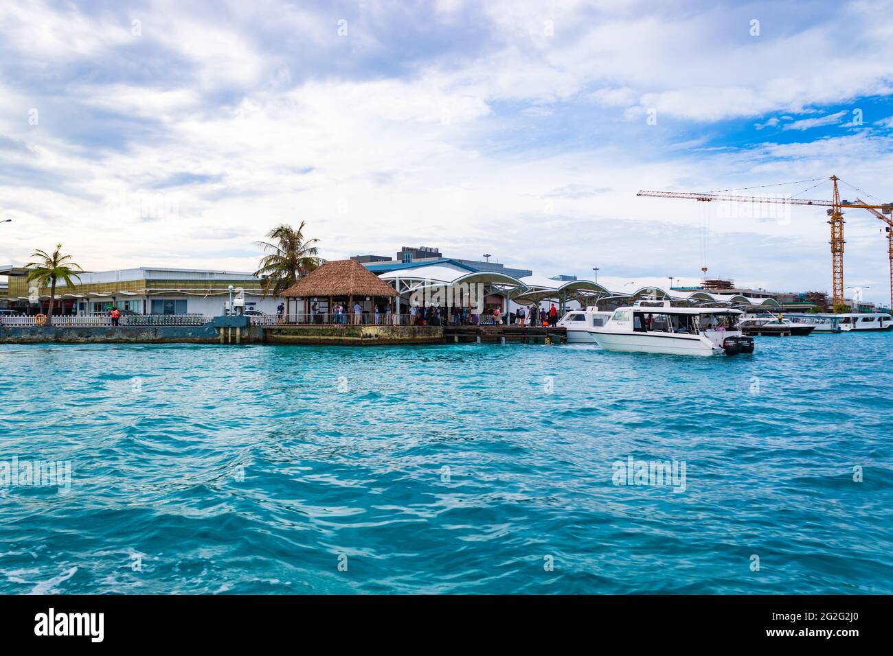 Boats at the terminal port in front of Velana International Airportat ...