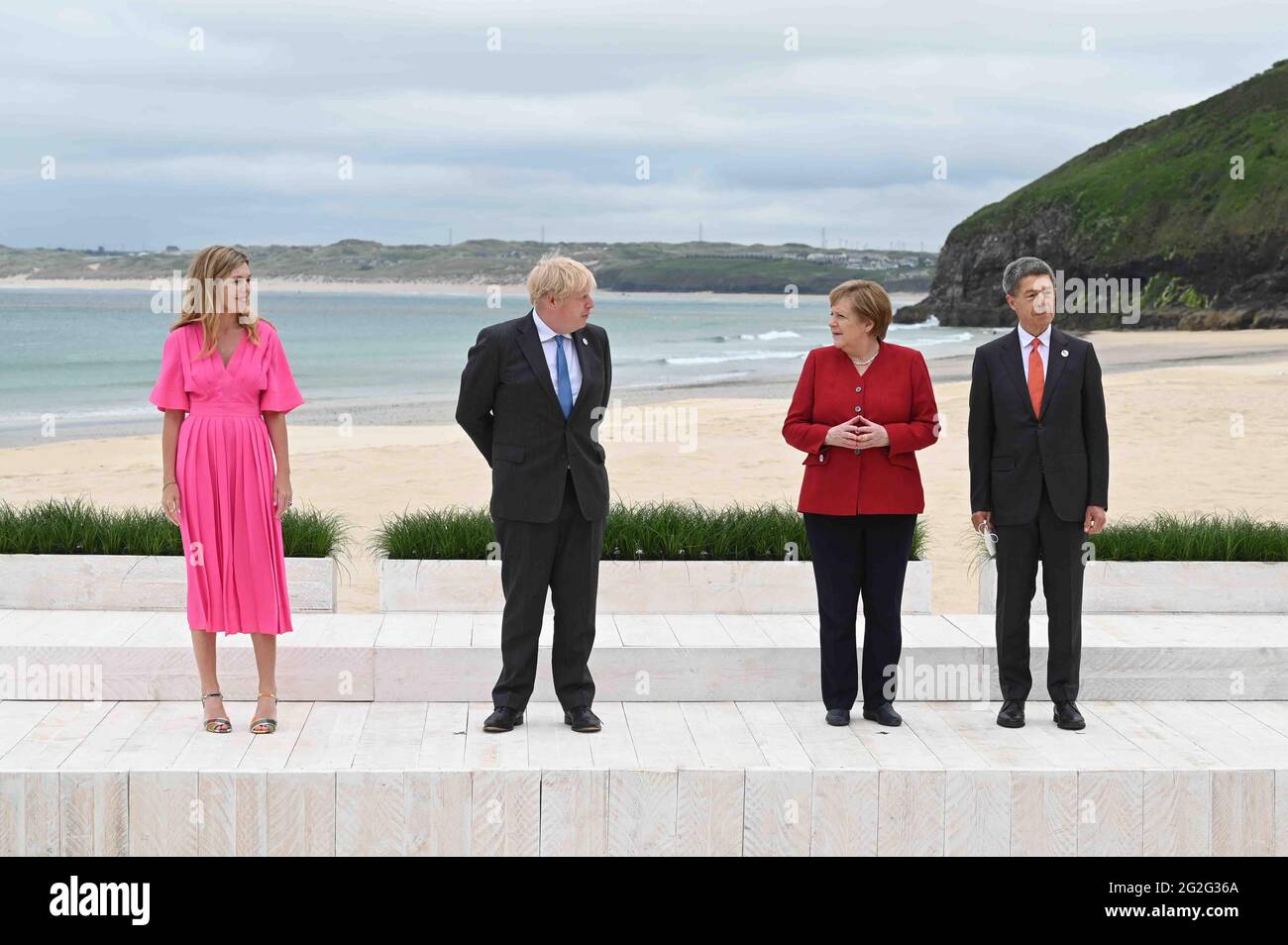 Prime Minister Boris Johnson and Carrie Johnson (left) with Chancellor ...