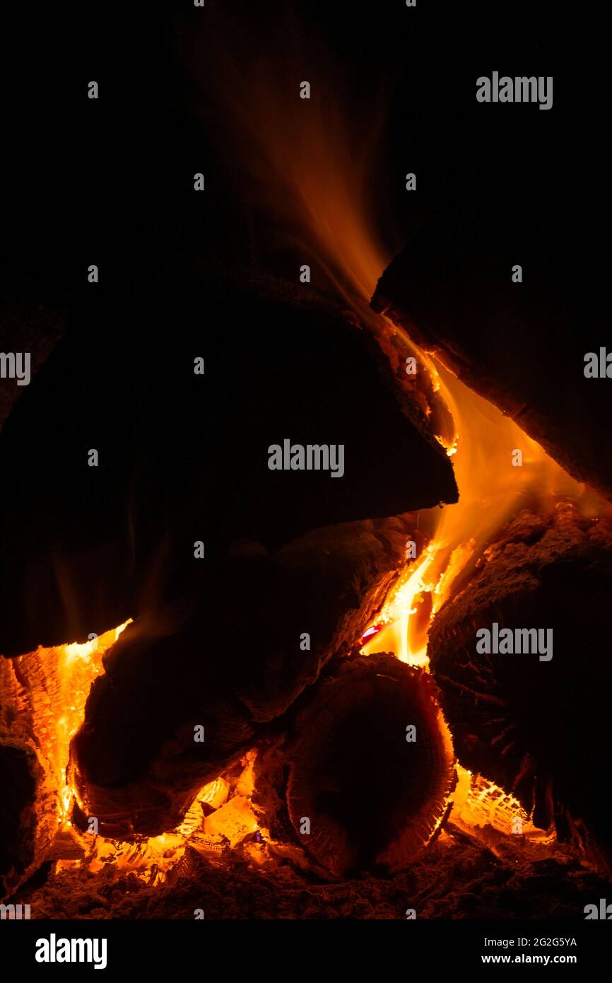 Burning logs - Long exposure fire Stock Photo - Alamy
