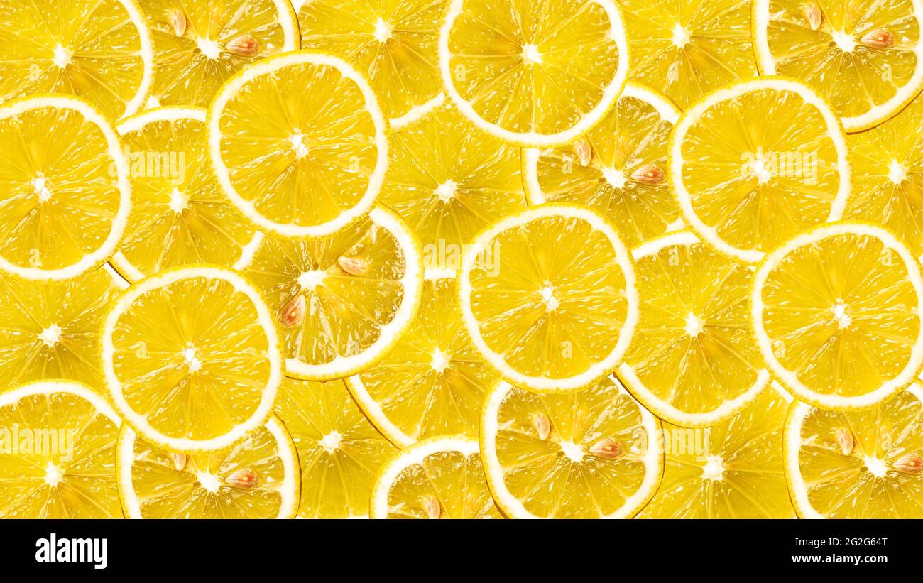 Organic lemon fruit slices natural juicy background Stock Photo - Alamy