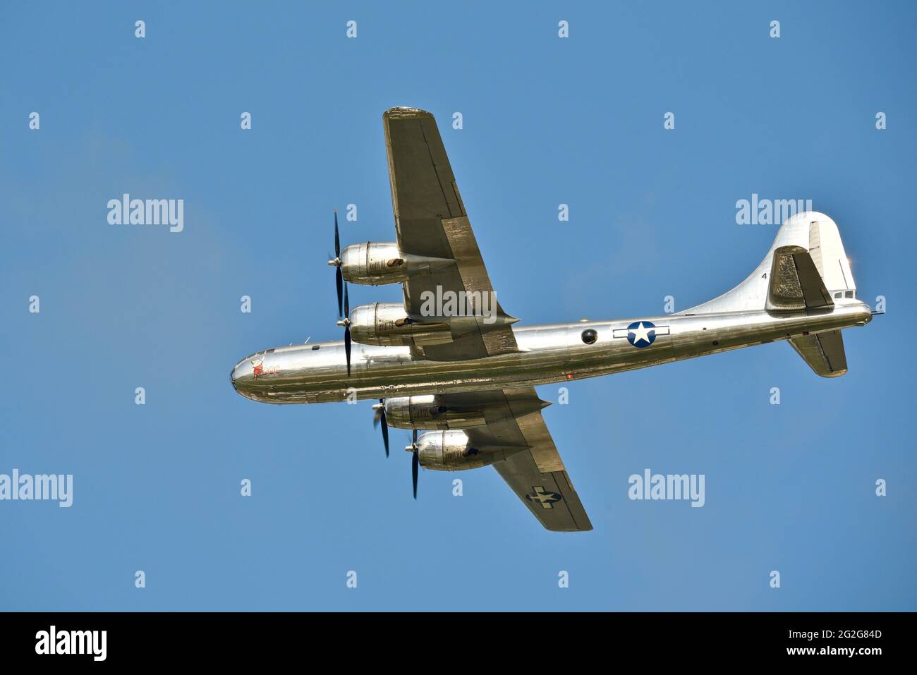 Massive B-29 Superfortress bomber, "Doc," from World War 2, flying over ...