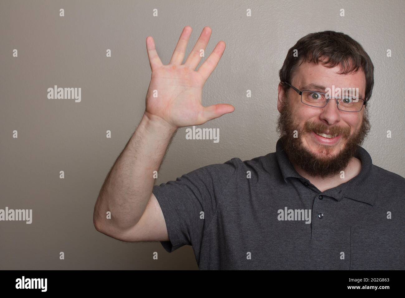 Man waving goodbye hi-res stock photography and images - Alamy