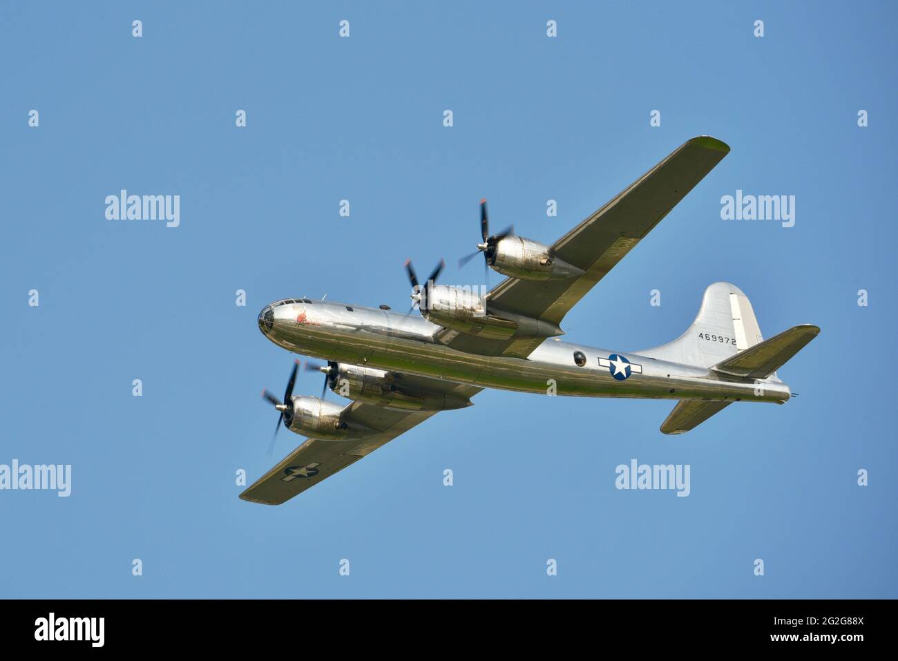 Massive B-29 Superfortress bomber, "Doc," from World War 2, flying over ...