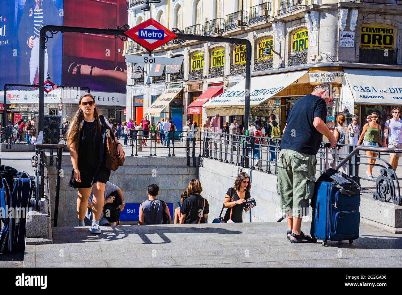Entrance to the Sol metro station. The Puerta del Sol, Gate of the Sun ...