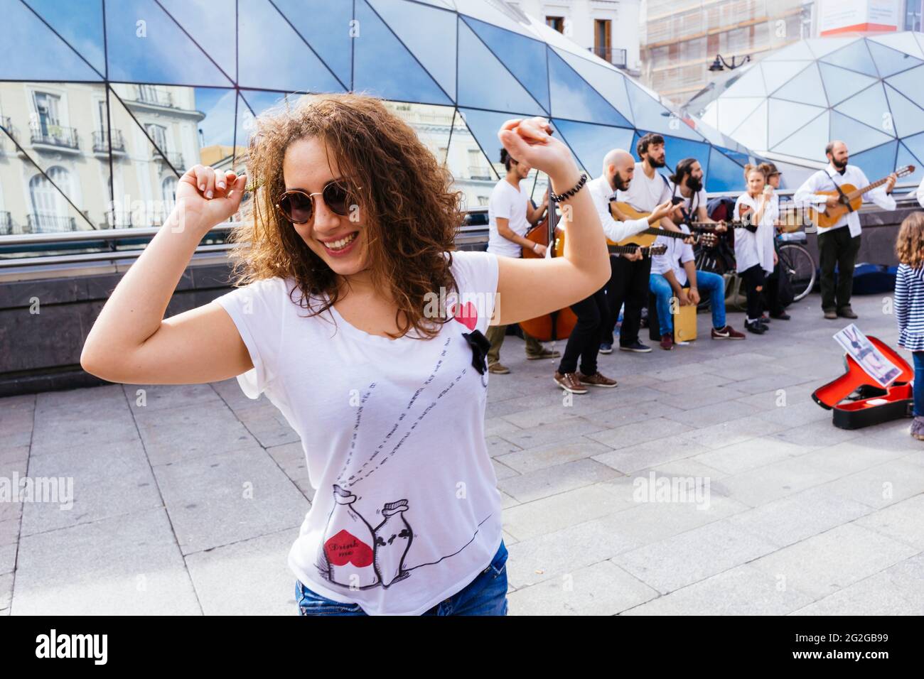Young woman busker street musician hi-res stock photography and images ...