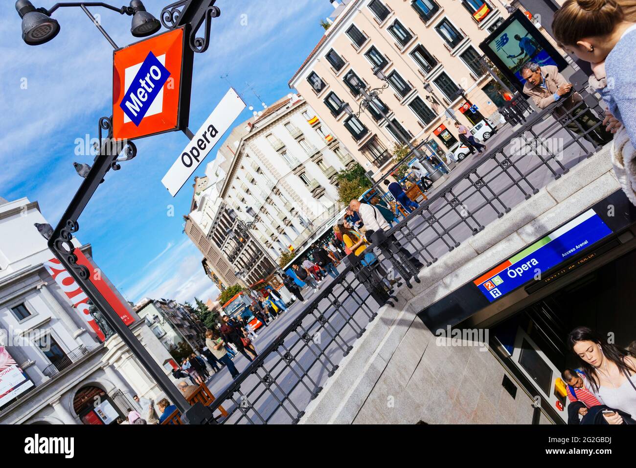 Entrance to the Ópera metro station. Plaza de Isabel II, also known as ...