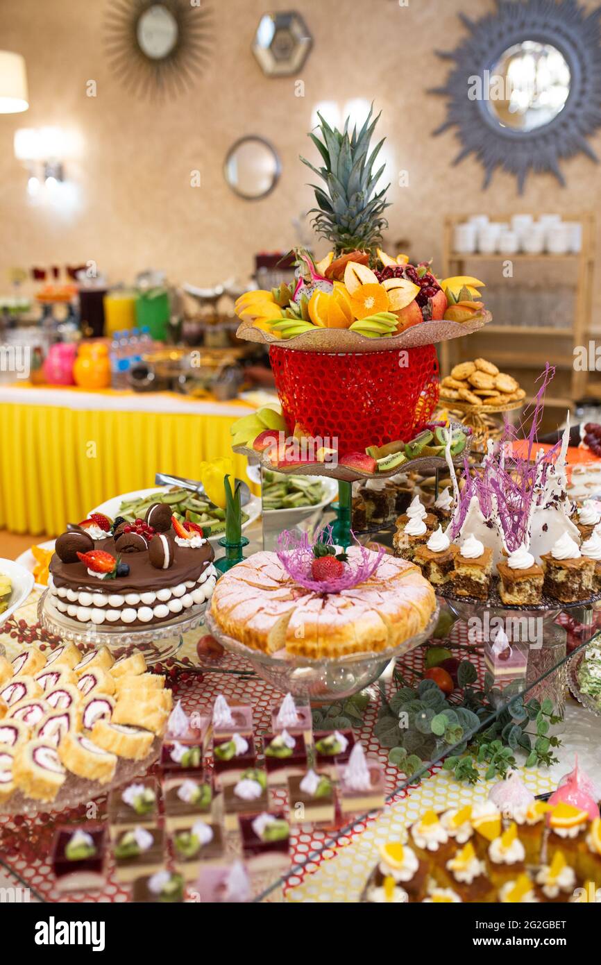 Table of sweets at a children's party in a cafe Stock Photo - Alamy