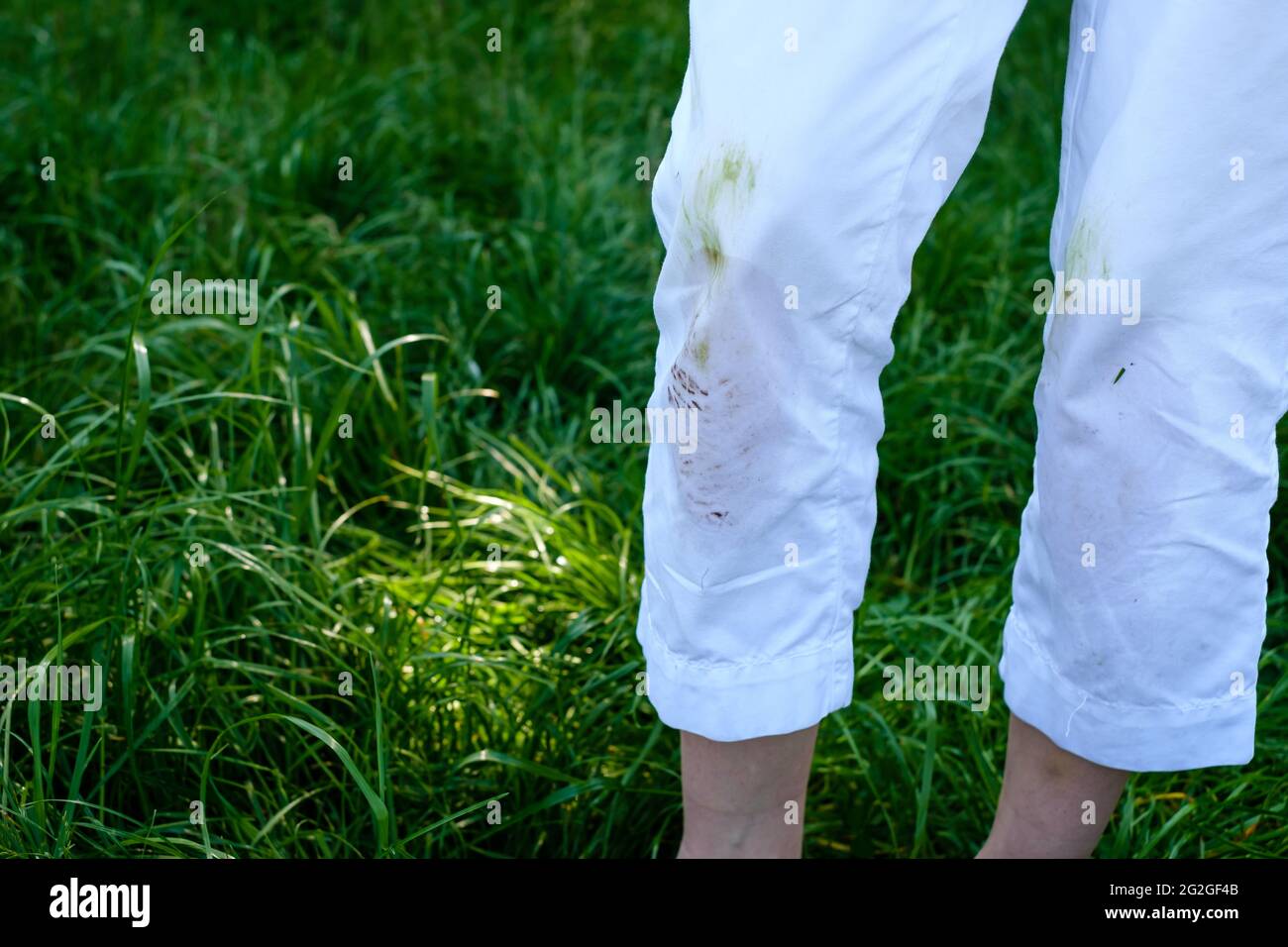 Dirty grass stains on casual clothes. daily life dirty stain for wash ...