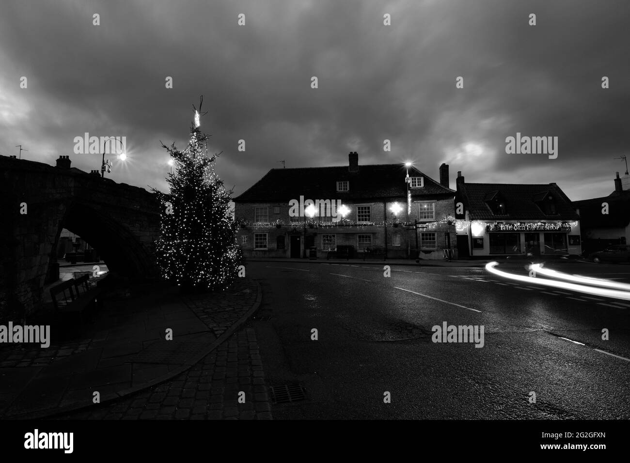 Christmas lights and tree, Trinity Bridge, a 14th Century three-way ...