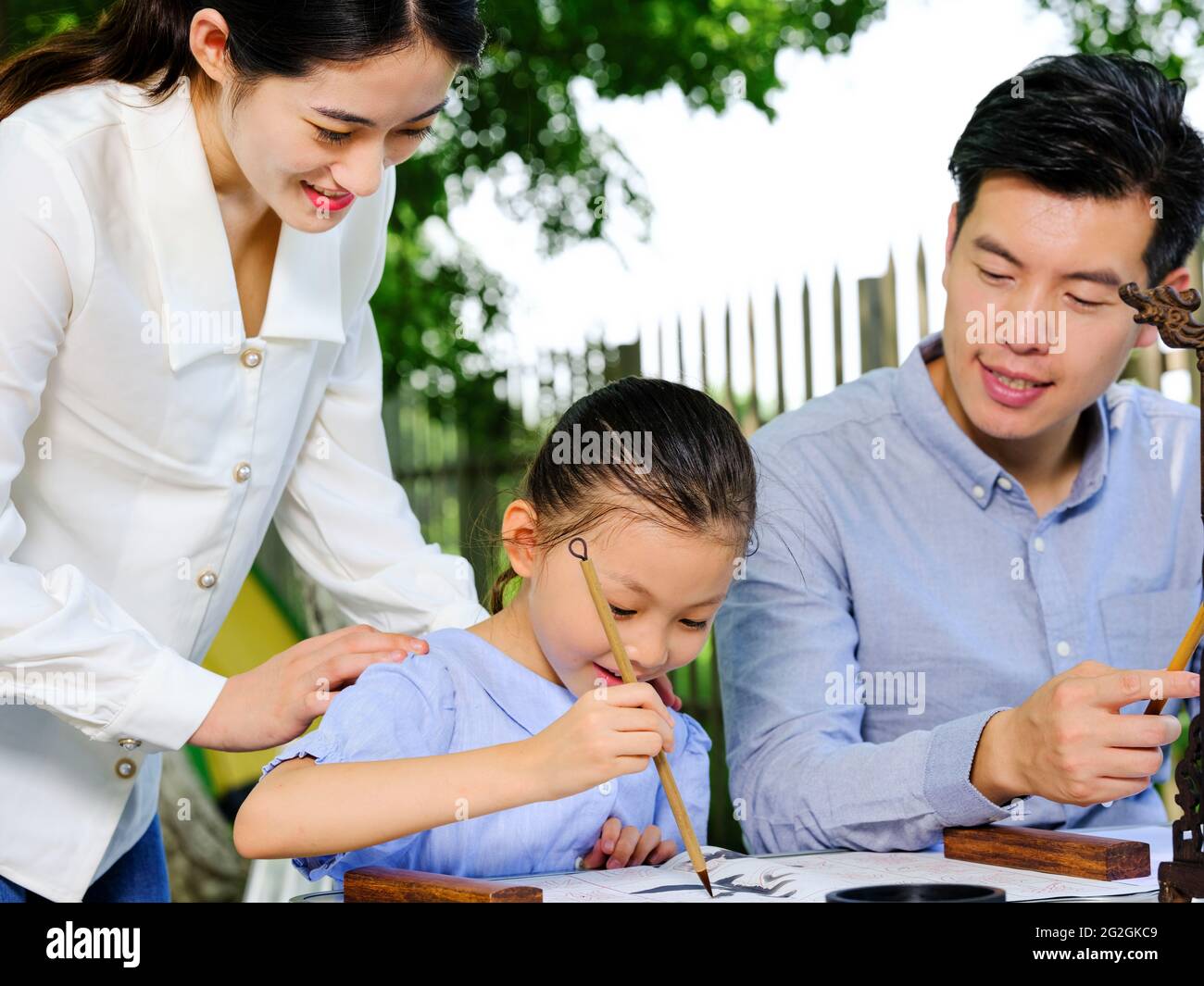 Teaching chinese calligraphy adult hi-res stock photography and images ...