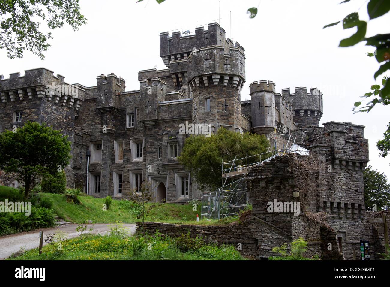 Wray Castle, a Gothic Revival castle on the shores of Lake Windermere, the Lake District, UK ...